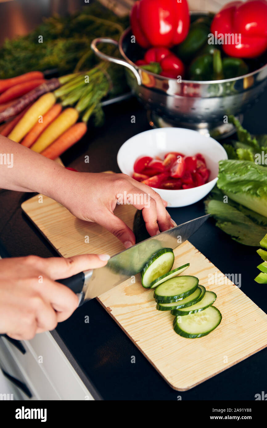 Woman preparing healthy food in kitchen Stock Photo - Alamy