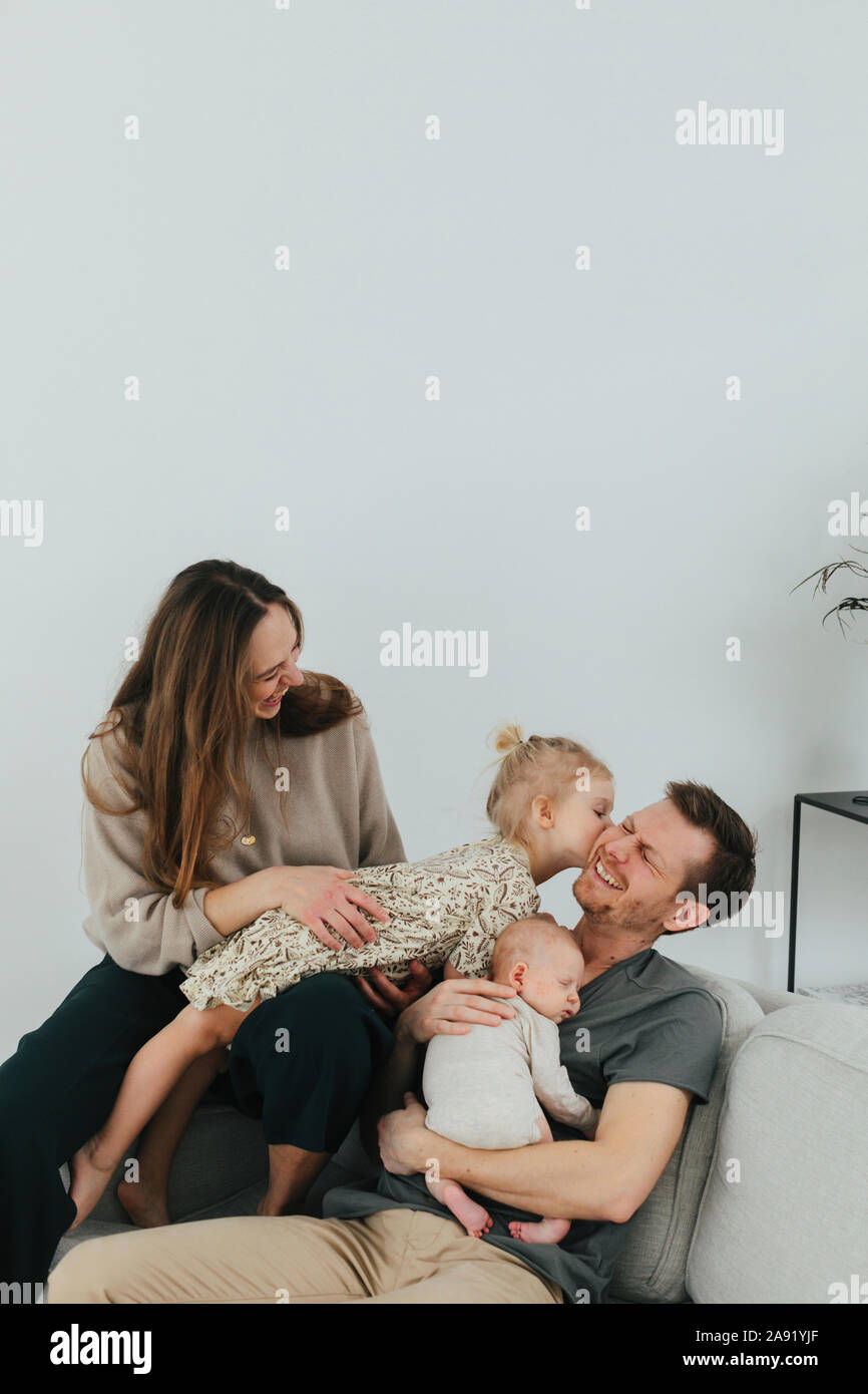Parents with two children Stock Photo - Alamy