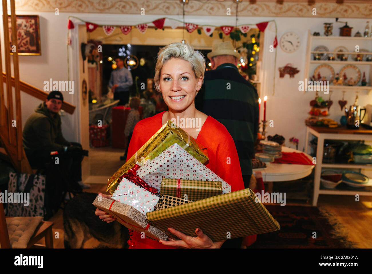 Carrying present hi-res stock photography and images - Alamy