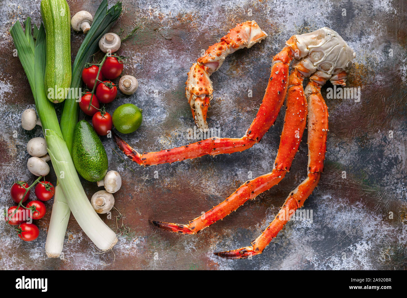 Various vegetables, fruits and mushrooms and Red crab claw on a rusty ...