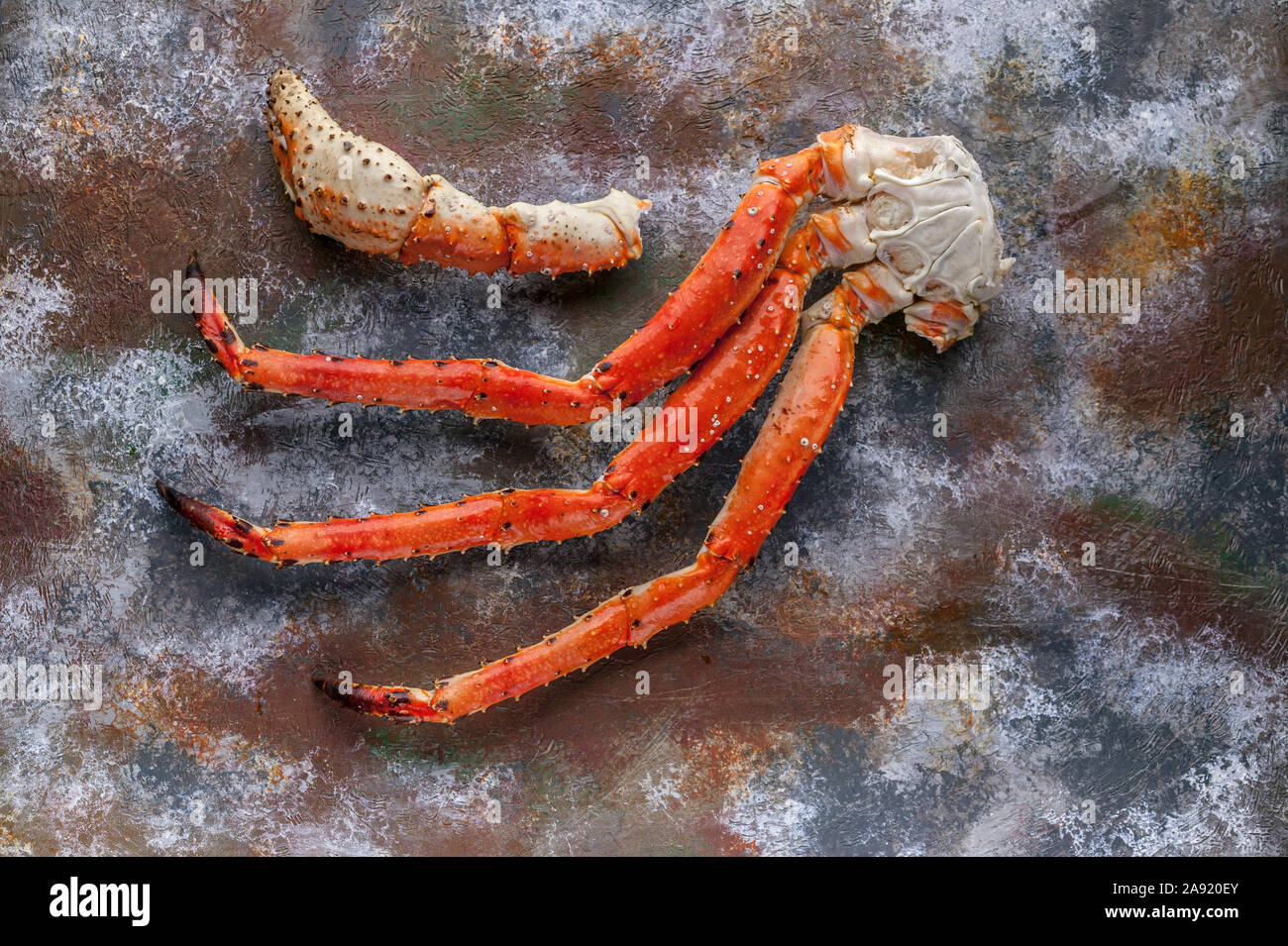 Red crab claw on a rusty background. Seafood. Top view Stock Photo - Alamy
