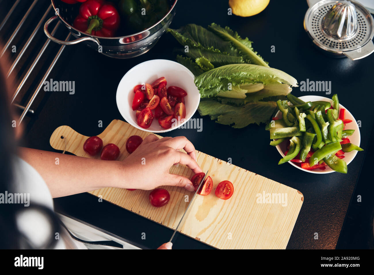 Woman preparing healthy food in kitchen Stock Photo - Alamy