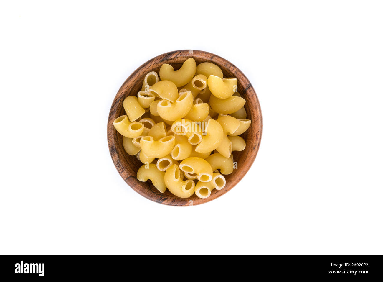 PIle of yellow dried elbow macaroni pasta shapes Stock Photo - Alamy
