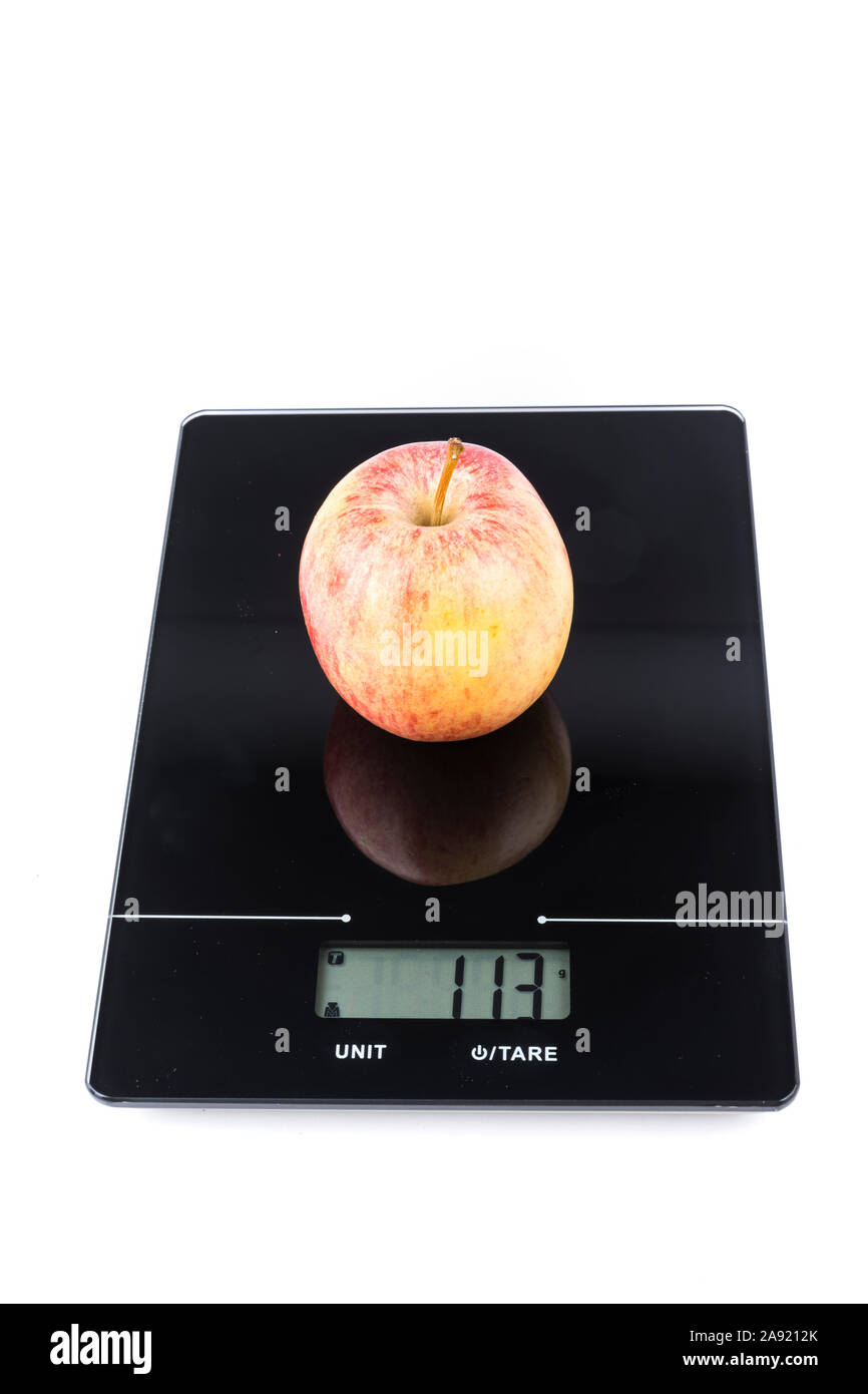 Balance scale apple Cut Out Stock Images & Pictures - Alamy