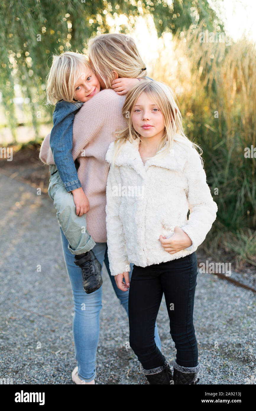 Mother with kids Stock Photo - Alamy