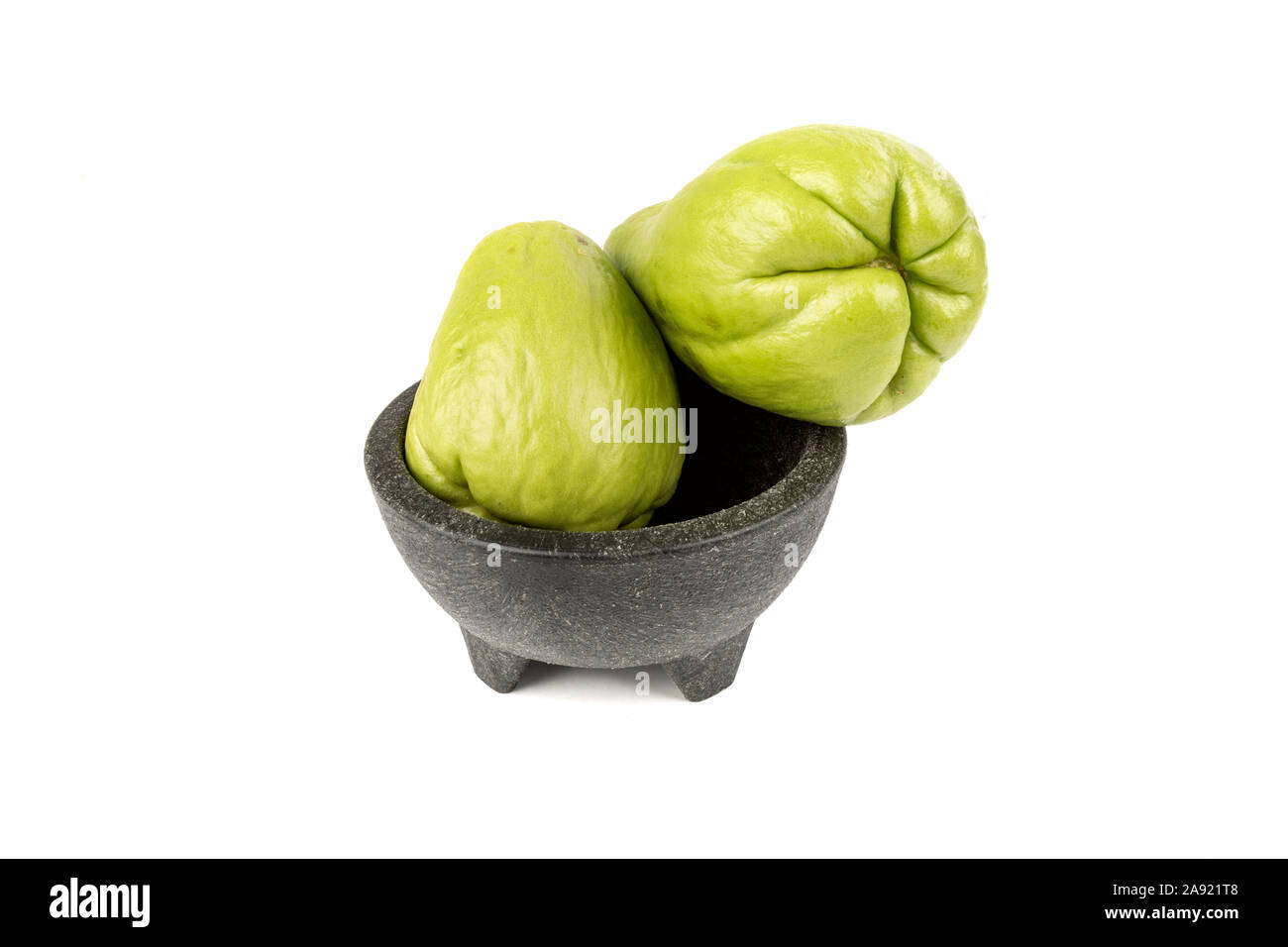 Two raw whole ripe green chayote mexican squash Stock Photo - Alamy