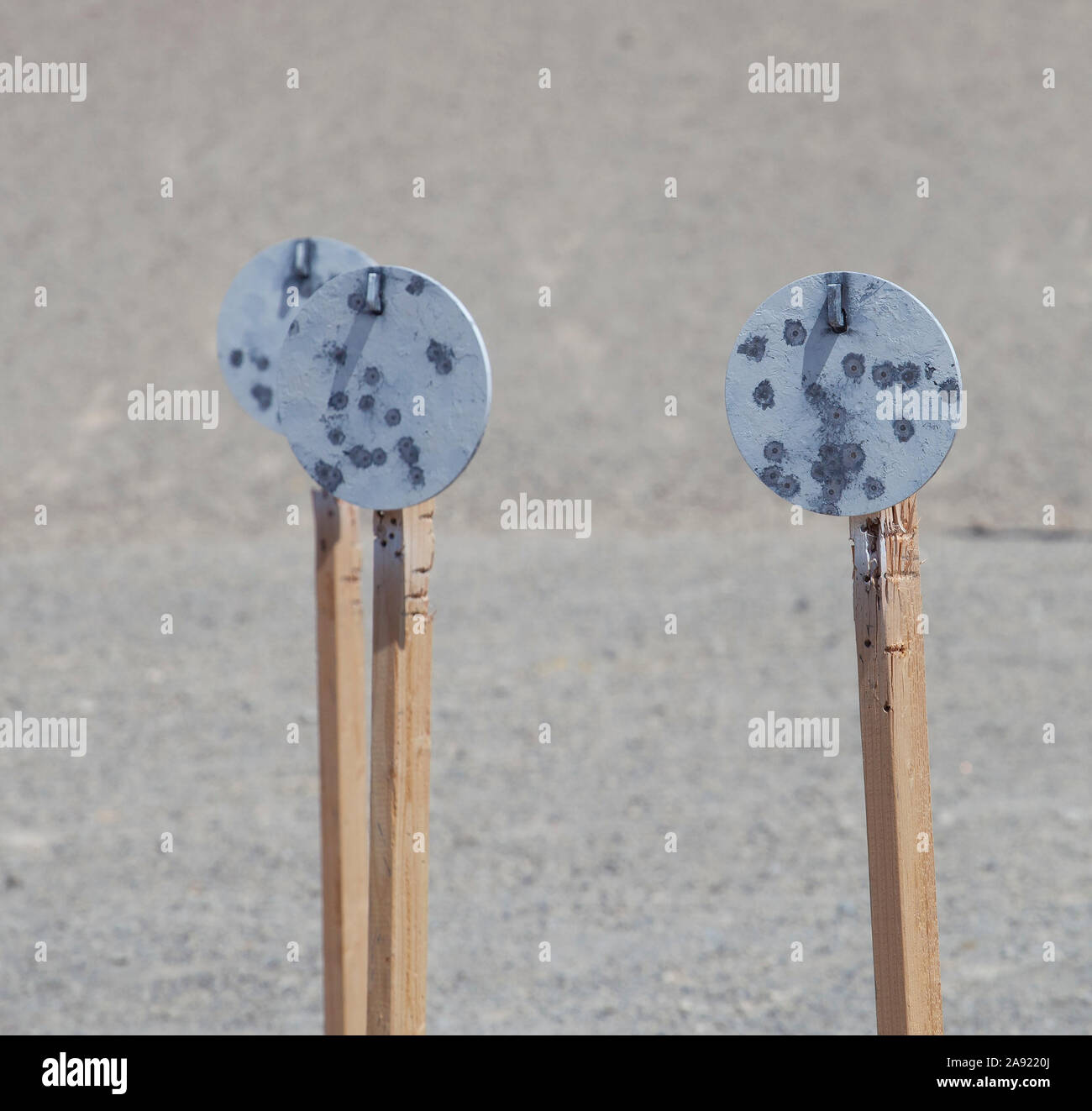 White steel plates with bullet splashes using for pistol practice Stock ...