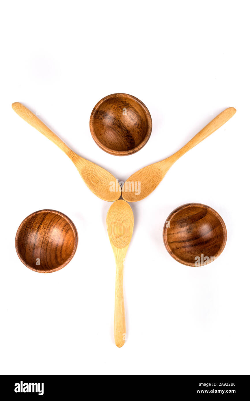 Three shallow bamboo spoons in a y shape for display with 3 bowls Stock ...