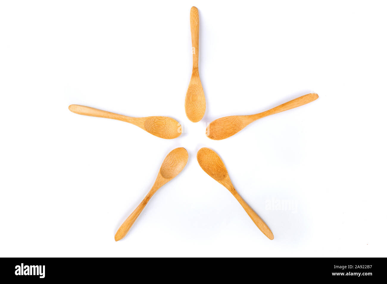 Five shallow bamboo spoons in a star shape Stock Photo - Alamy