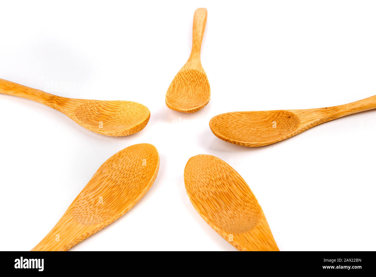 Five shallow bamboo spoons in a star shape Stock Photo - Alamy