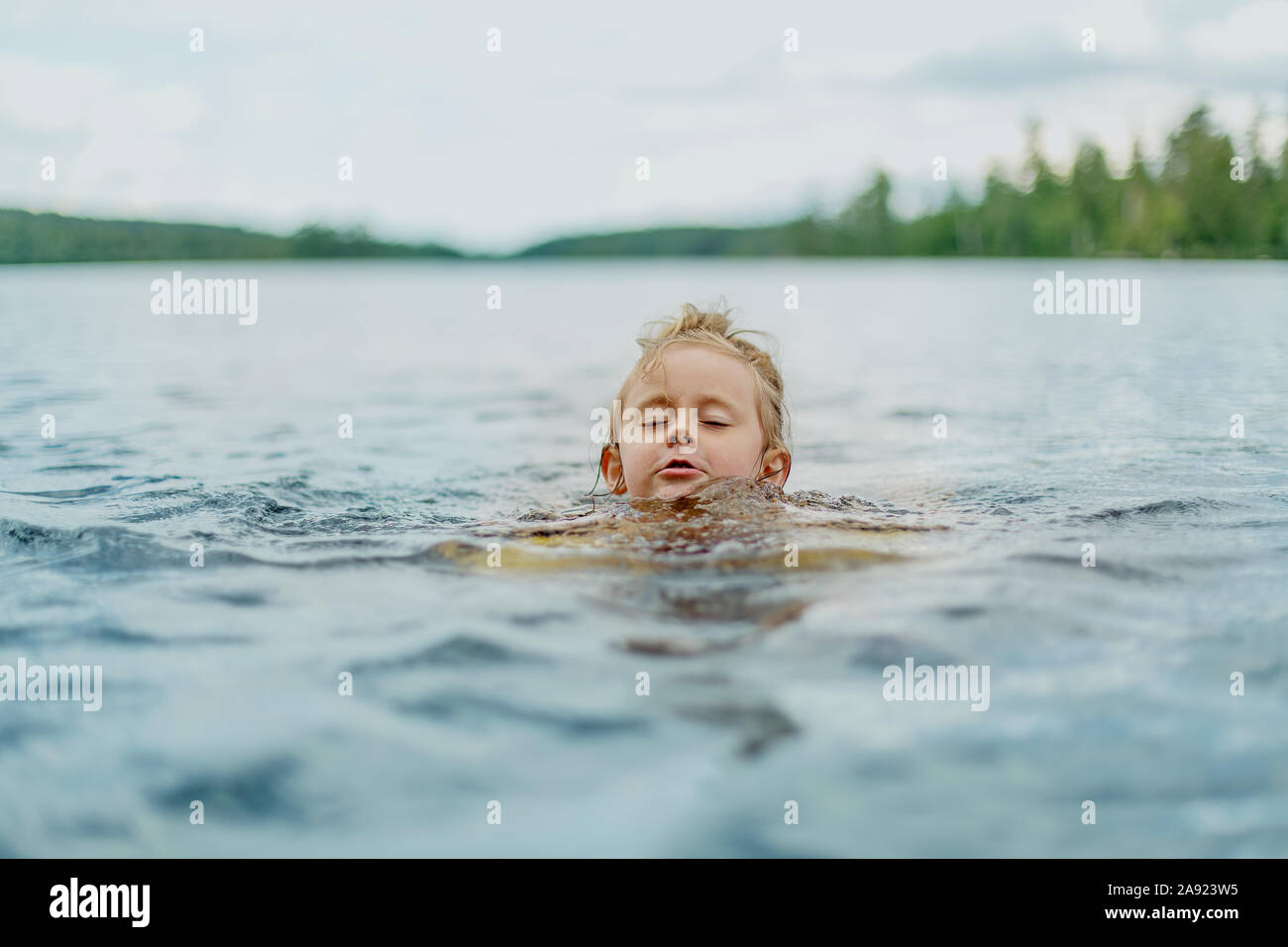 Image of person swimming hi-res stock photography and images - Alamy