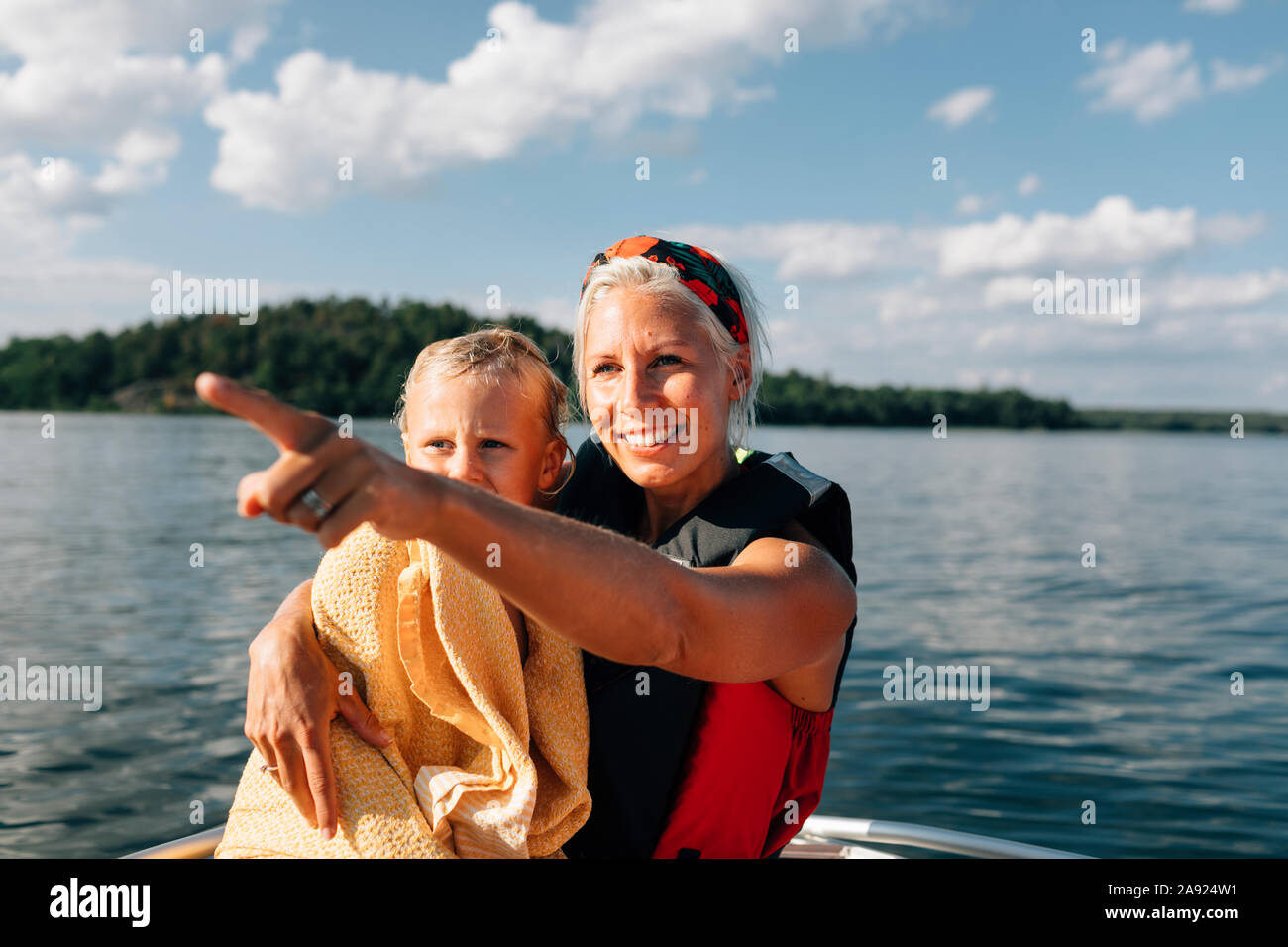 Mother with daughter on boat Stock Photo - Alamy