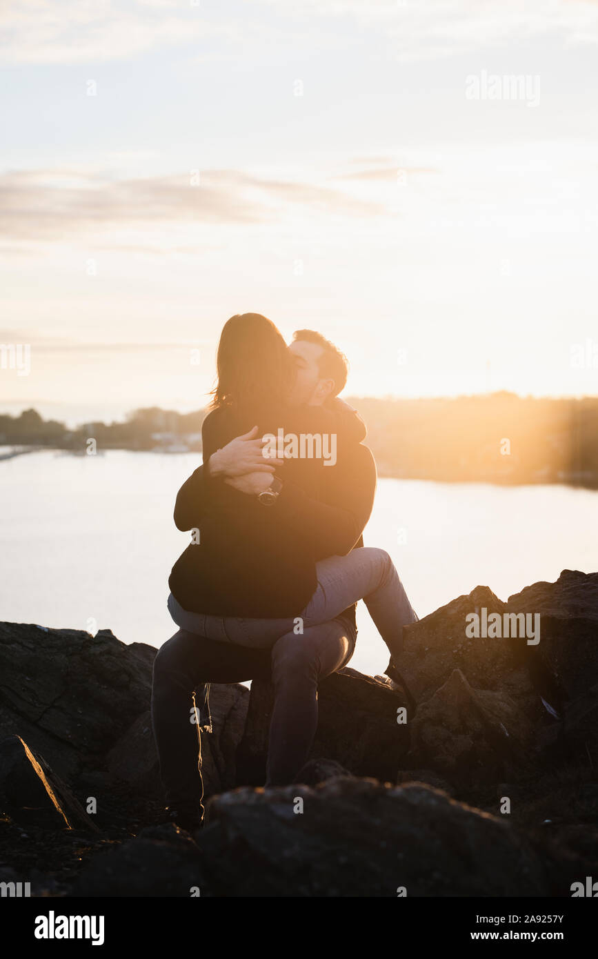 Back hug couple hi-res stock photography and images - Alamy