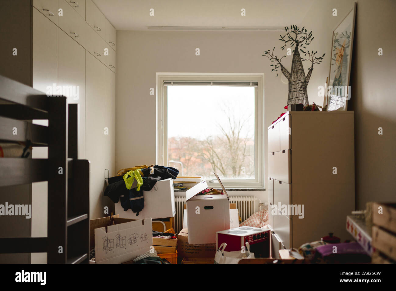 Cardboard boxes in room Stock Photo - Alamy