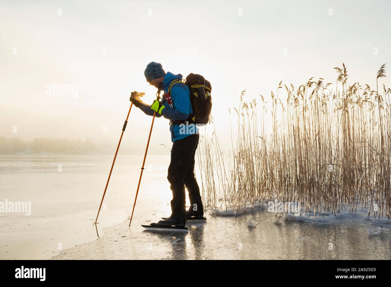 Side view man ice skating hi-res stock photography and images - Alamy