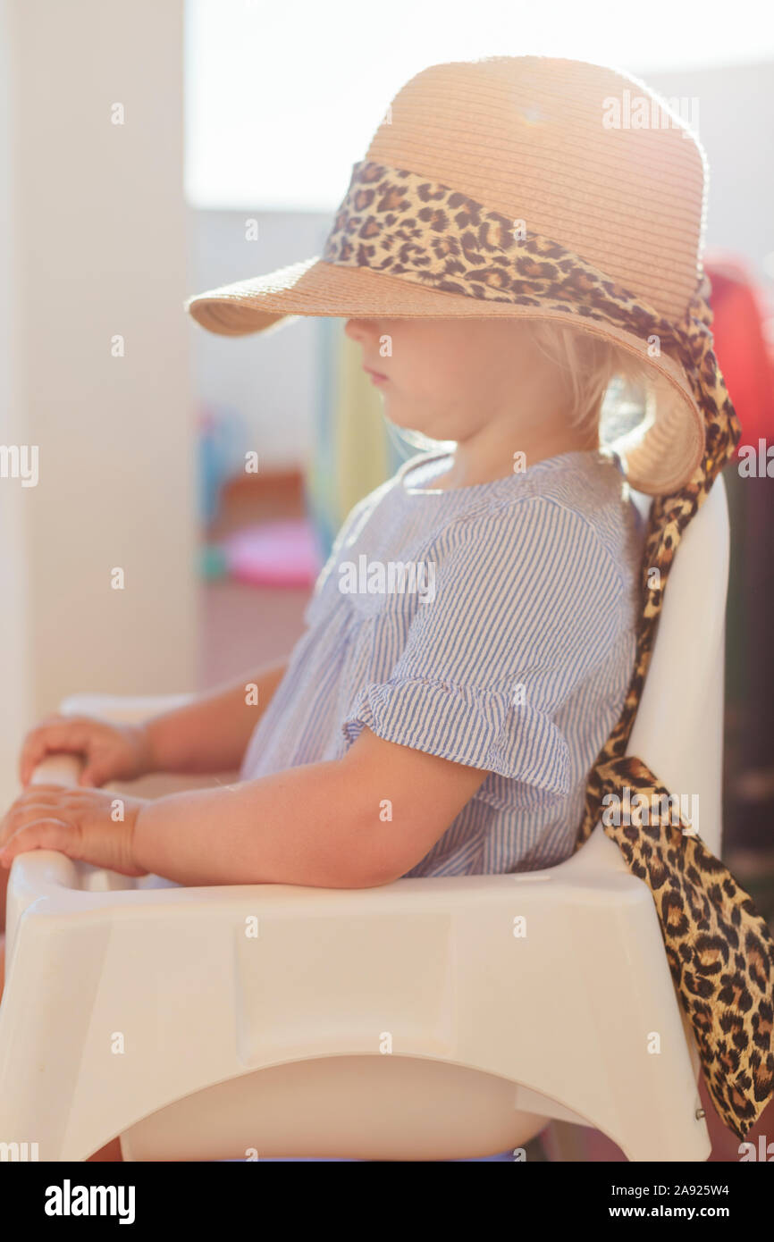 Girl on the chair hi-res stock photography and images - Alamy