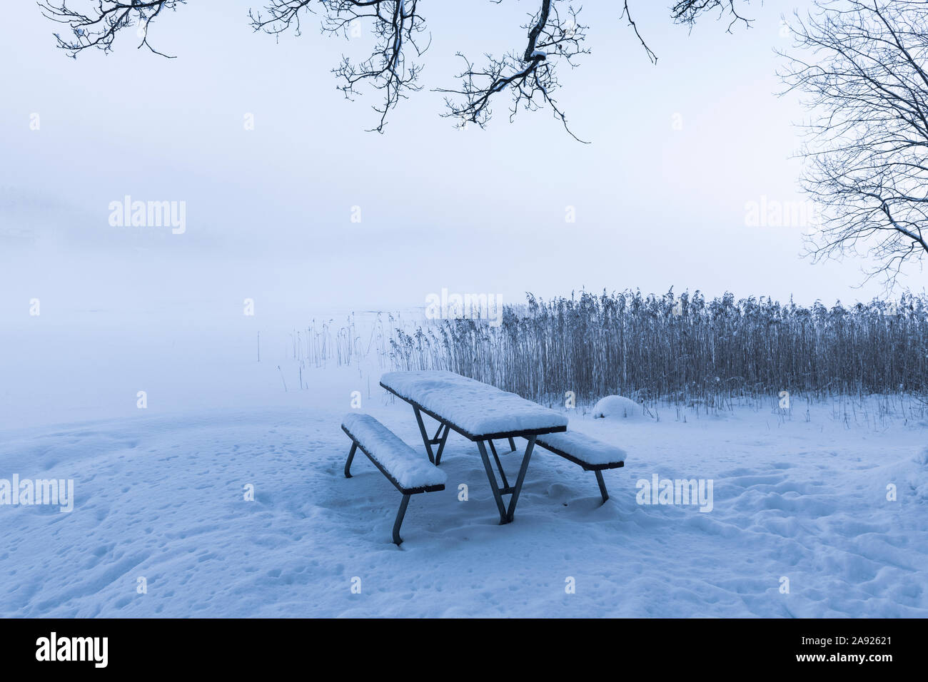 Picnic bench at winter Stock Photo - Alamy