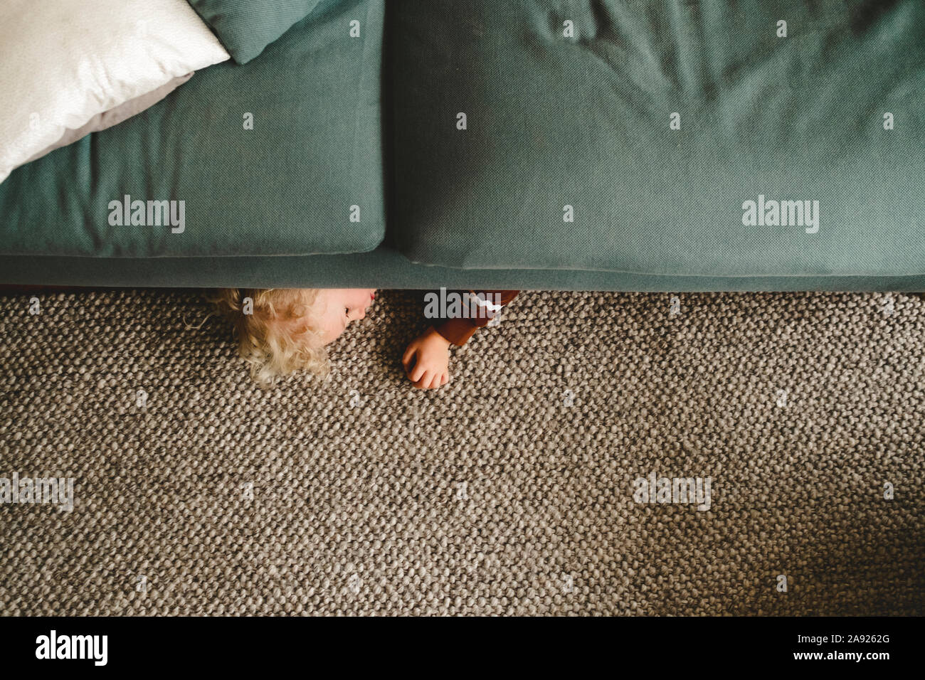 Boys lying on sofa hi-res stock photography and images - Alamy