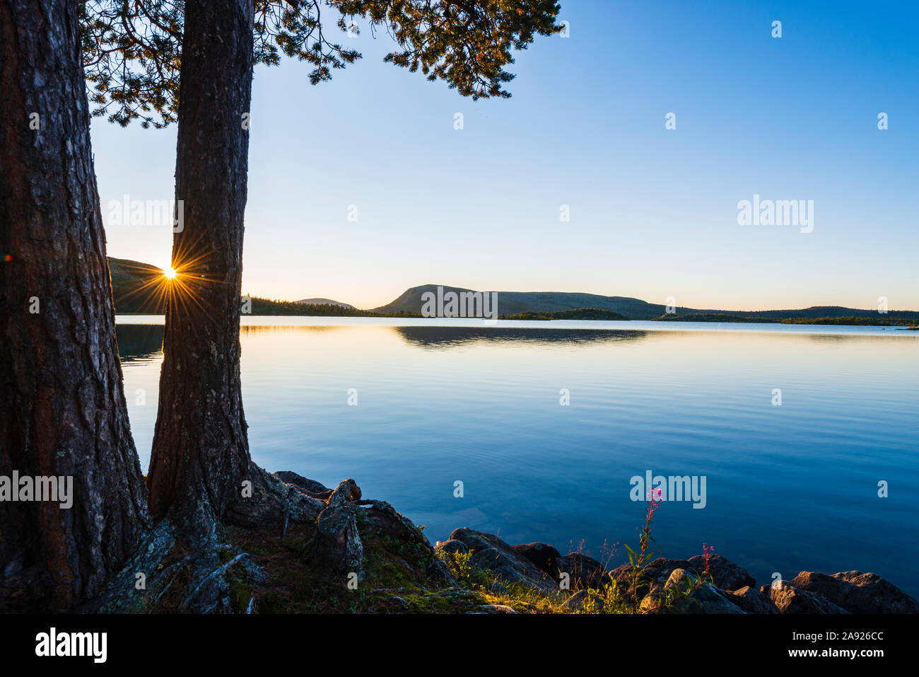 Lake at sunset Stock Photo - Alamy