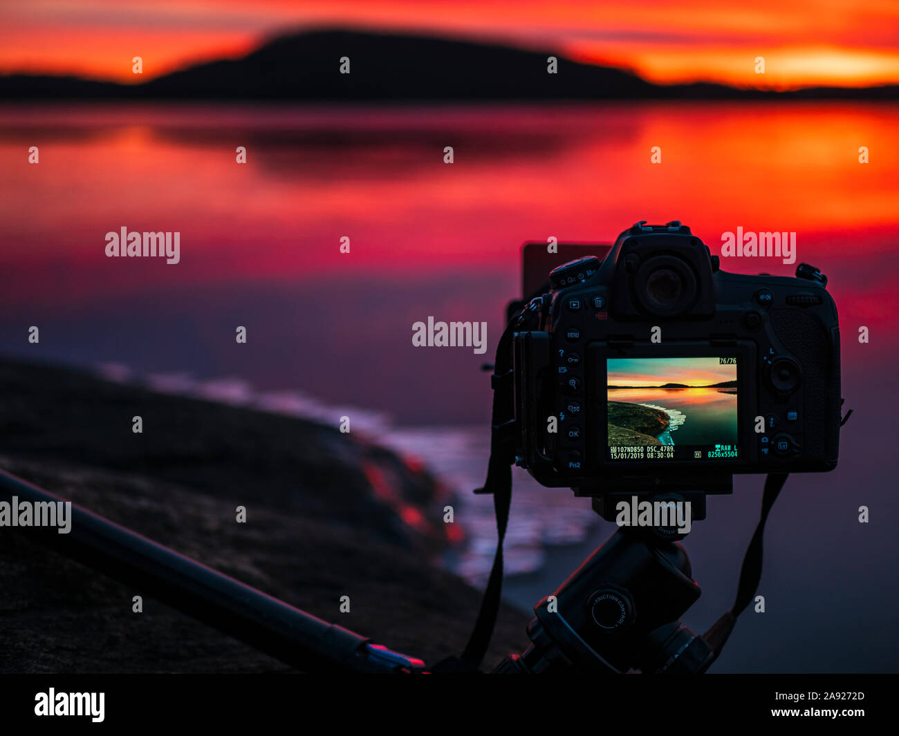 Sunset at lake on digital camera screen Stock Photo - Alamy