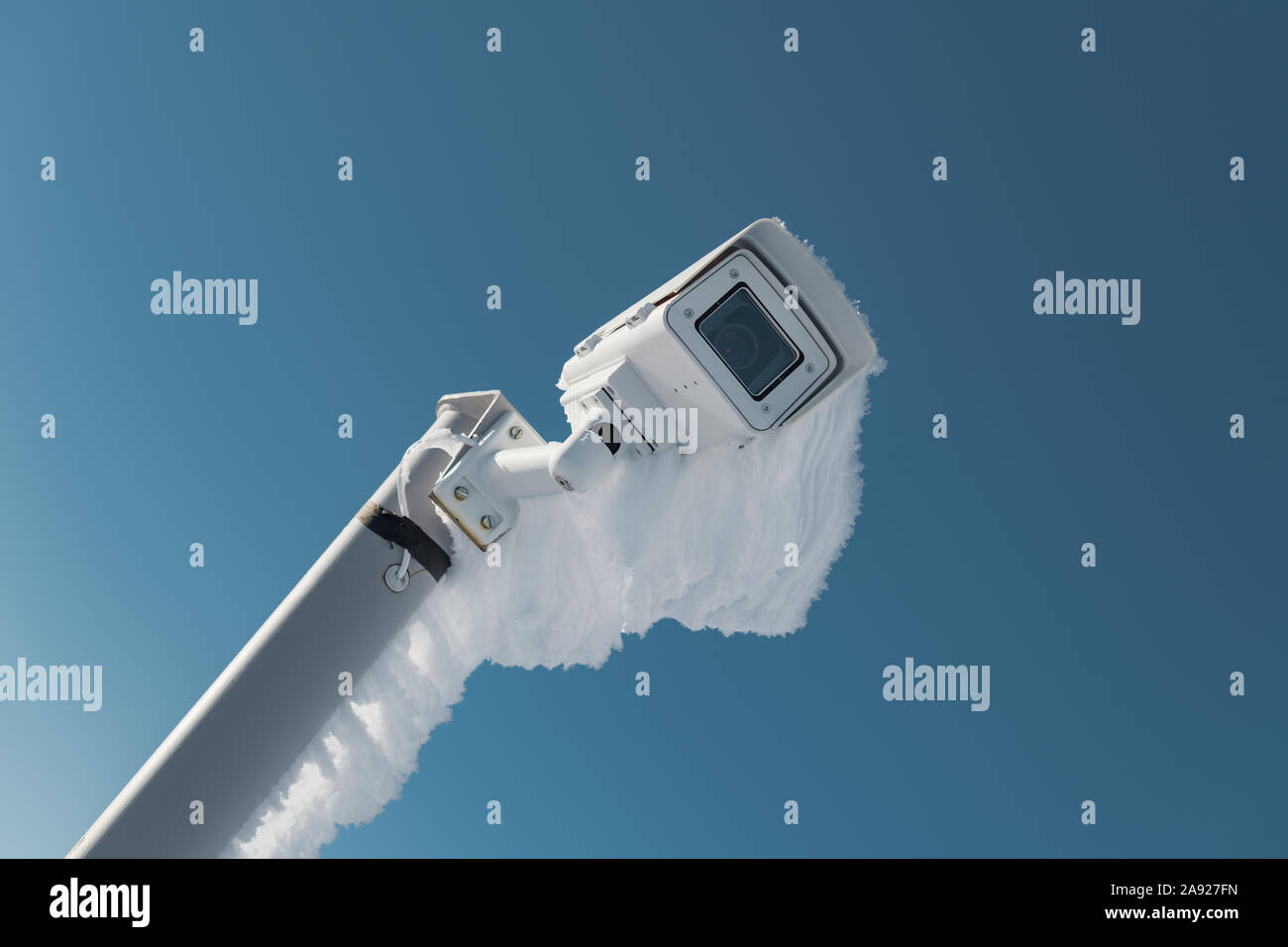 Security camera covered with snow Stock Photo - Alamy