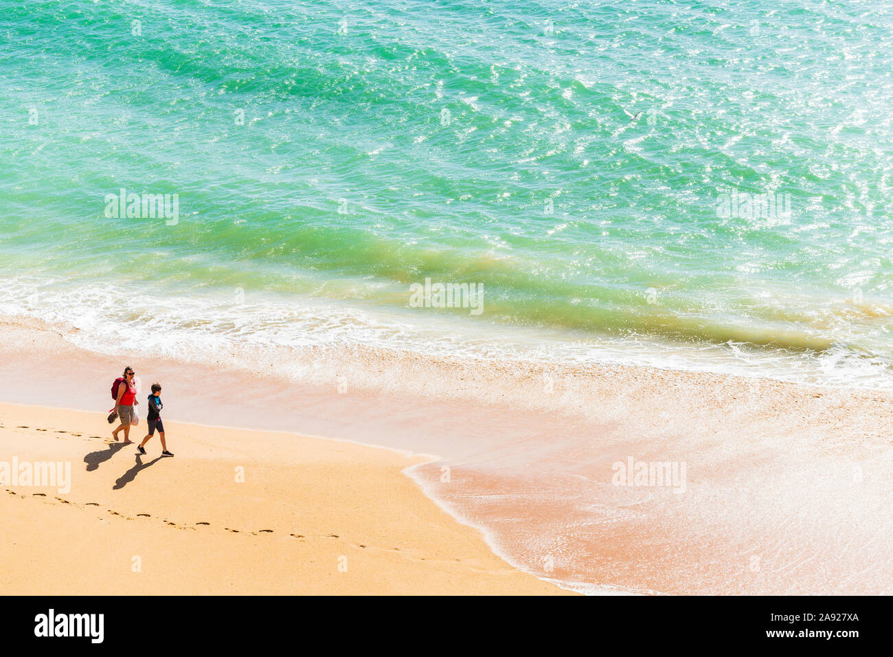People on sandy beach Stock Photo - Alamy