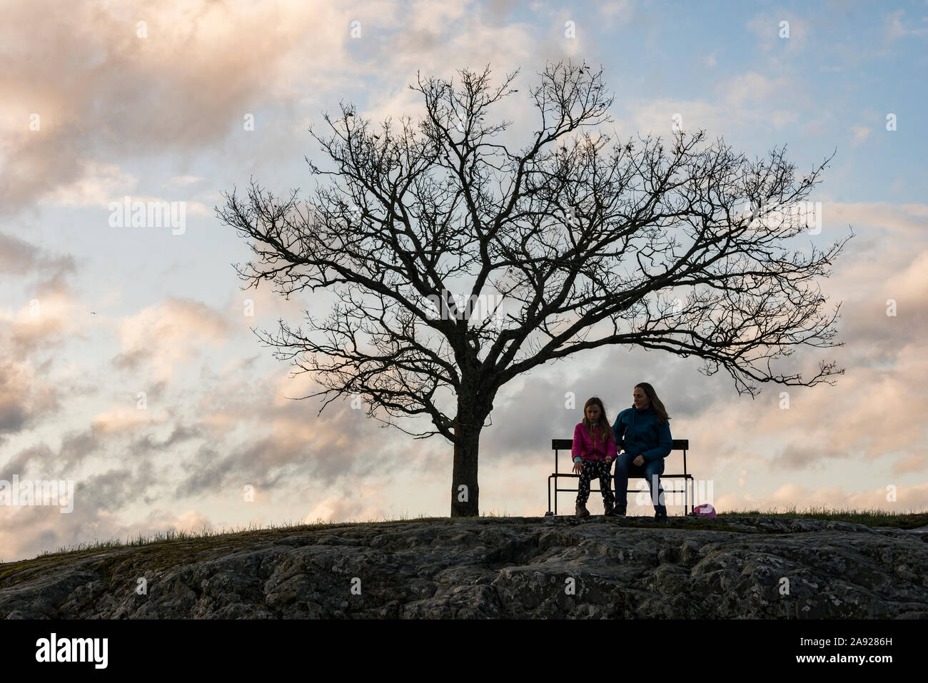 People on bench Stock Photo - Alamy
