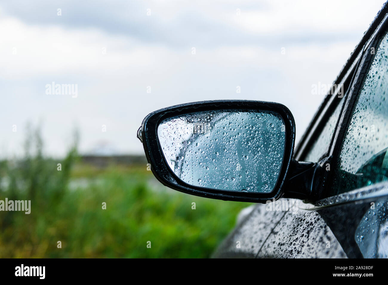 Reflection in side mirror Stock Photo - Alamy