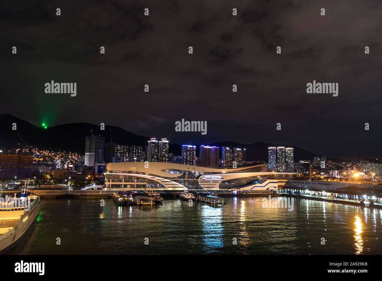 Night view of the port and the international passenger terminal of ...