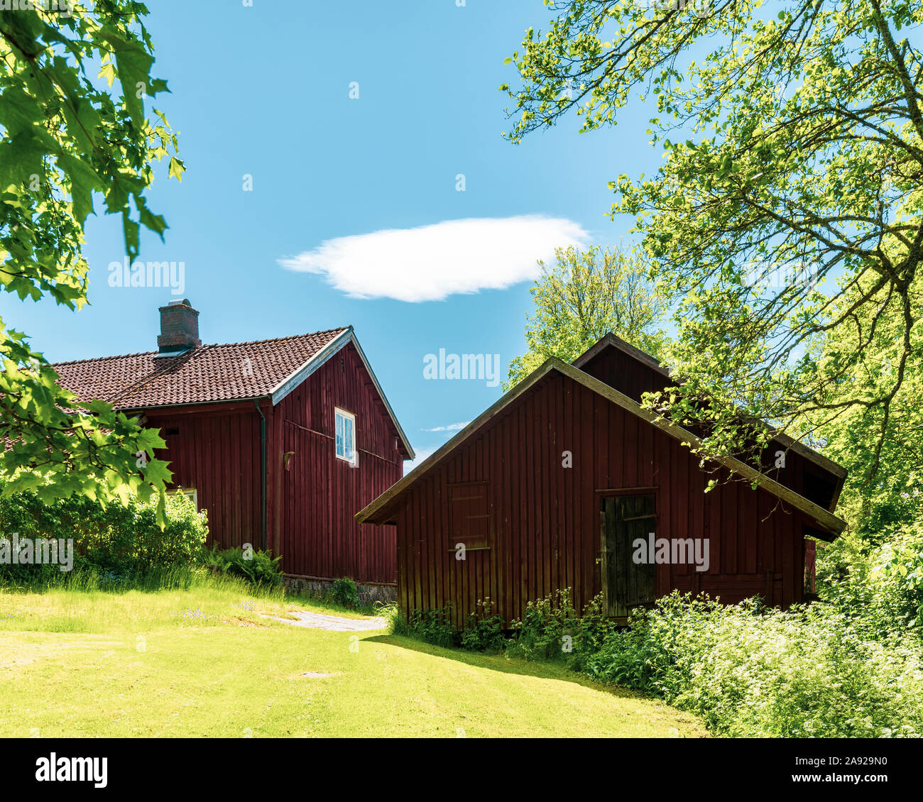 Wooden red houses hi-res stock photography and images - Alamy