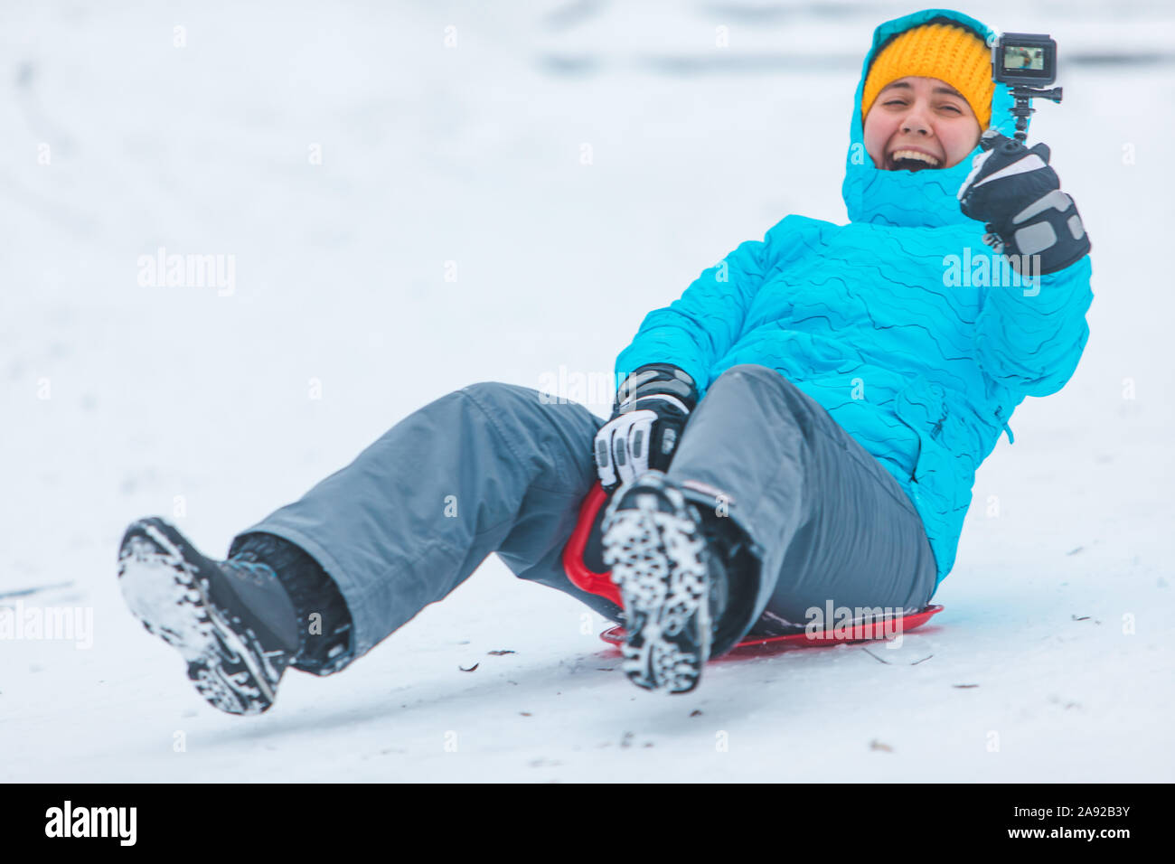 Woman sliding down hi-res stock photography and images - Alamy