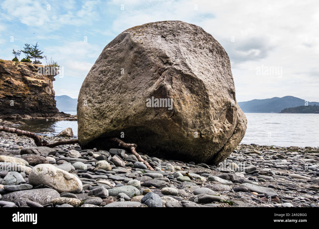 A large granite boulder left behind by retreating glaciers of the last ...