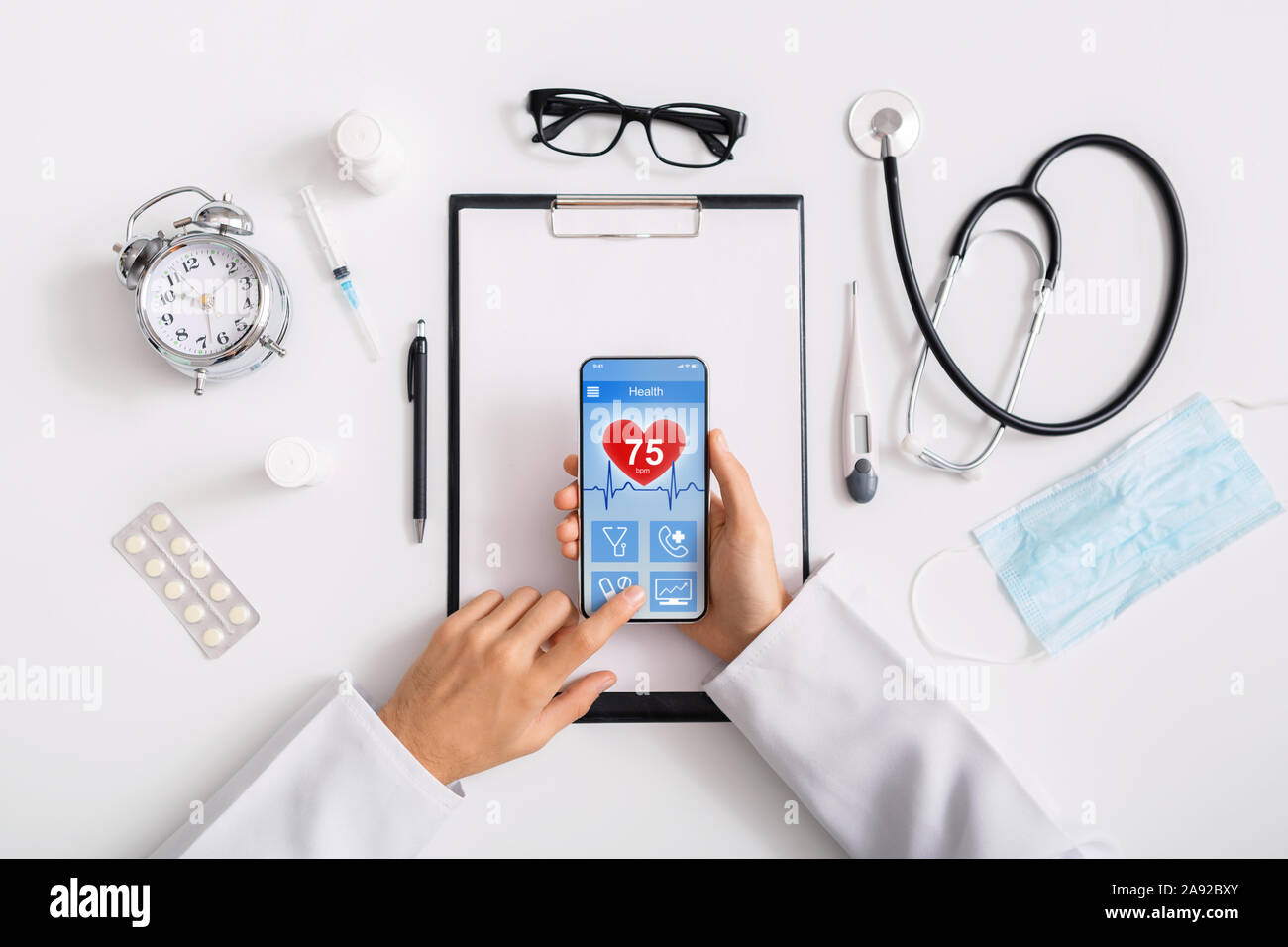 Doctor analyzing data hi-res stock photography and images - Alamy