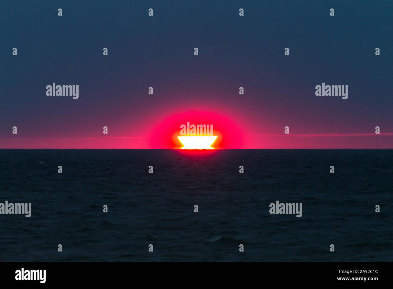 Red Sun Rise over Lake Ontario Stock Photo - Alamy