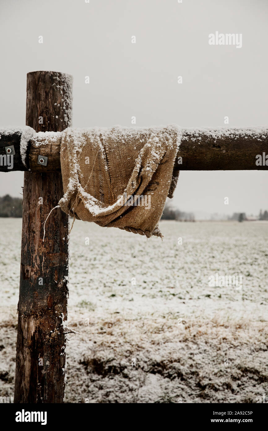 Hessian on wooden fence Stock Photo - Alamy