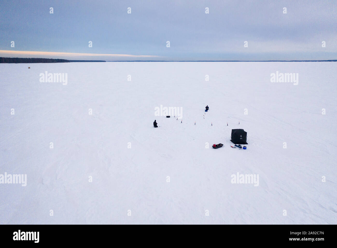 Fishing on frozen lake hi-res stock photography and images - Alamy