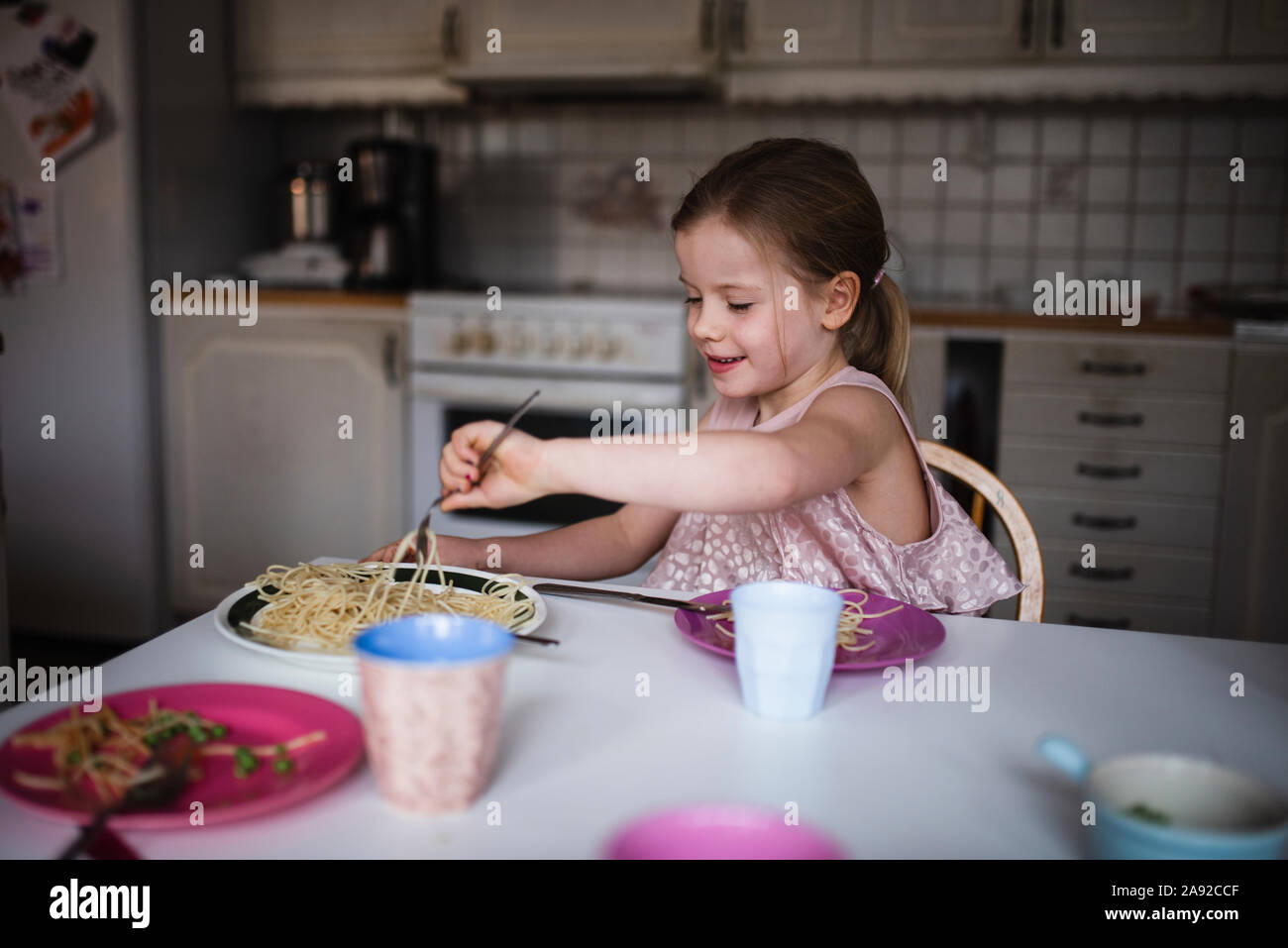 Smiling sitting eating food and drink hi-res stock photography and ...
