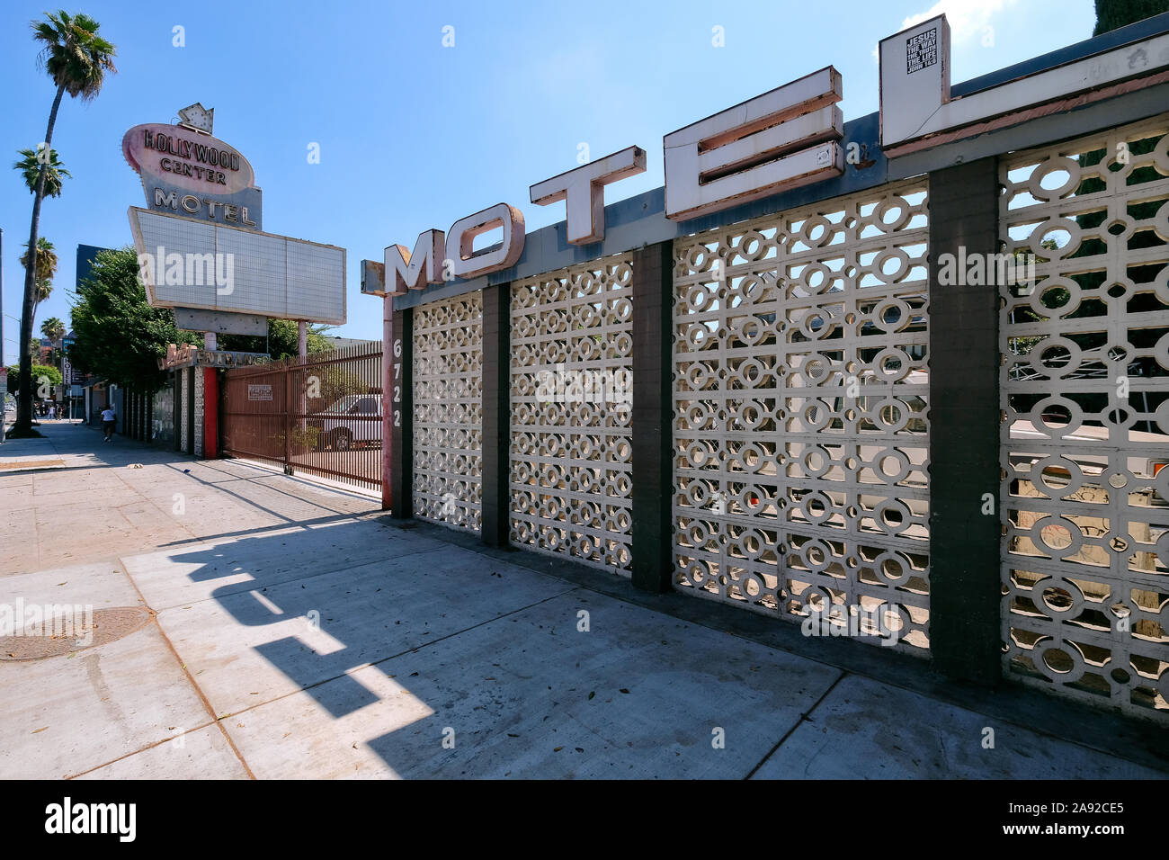 Entrance and illuminated advertising of the Hollywood Center Motel on ...