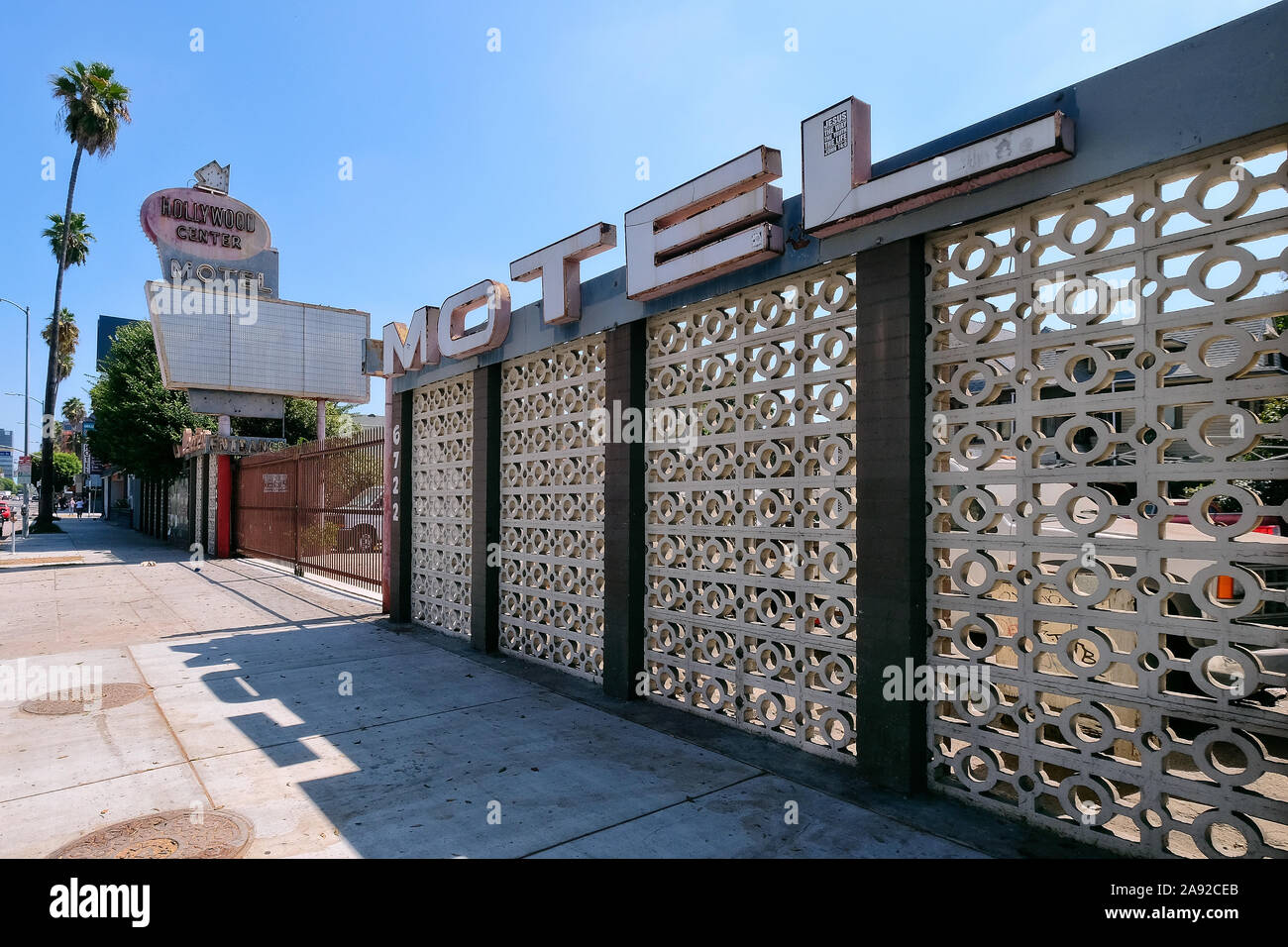 Entrance and illuminated advertising of the Hollywood Center Motel on ...