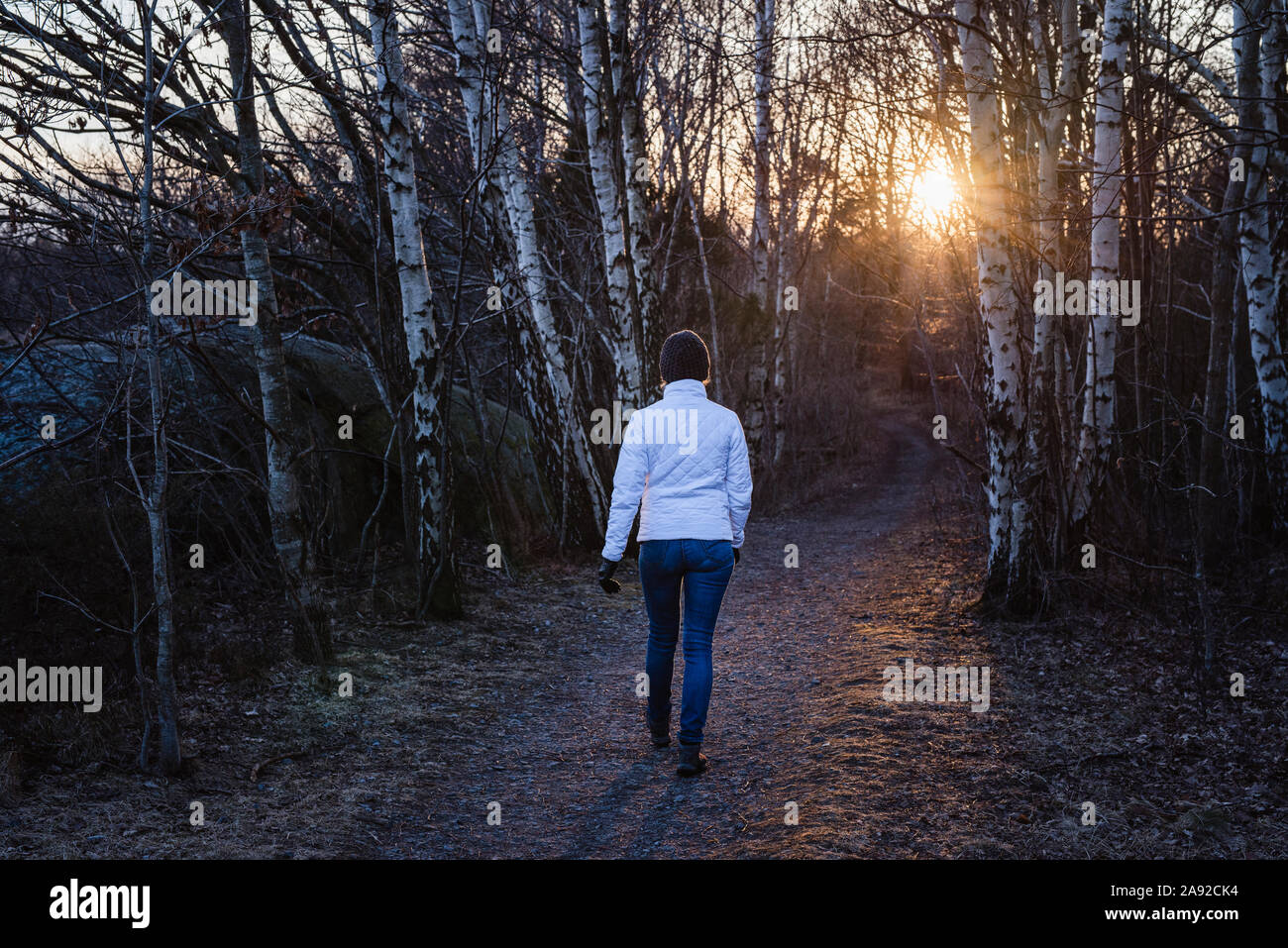 Woman walking promenade trees hi-res stock photography and images - Alamy