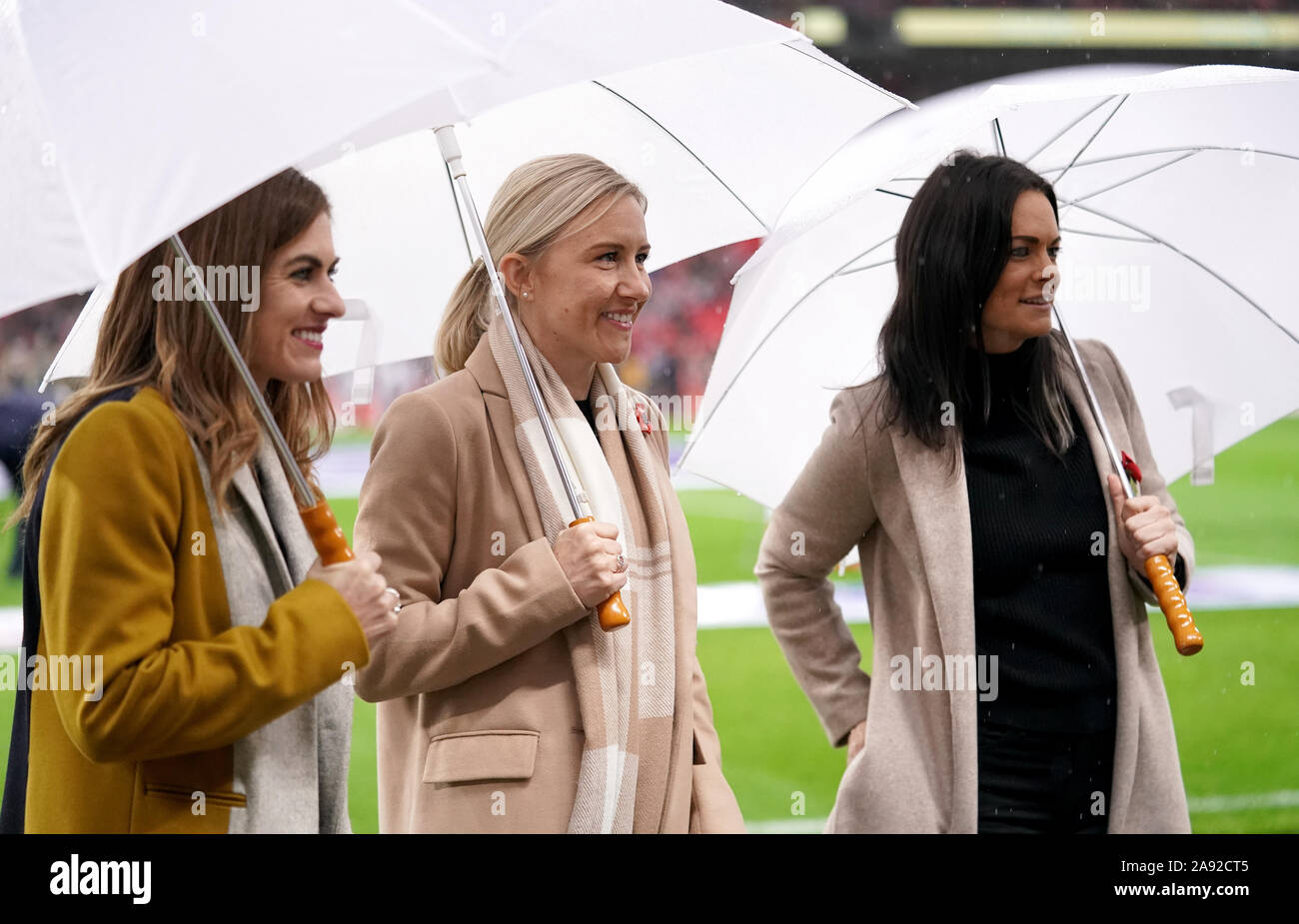 Former England internationals Karen Carney (left), Laura Bassett ...