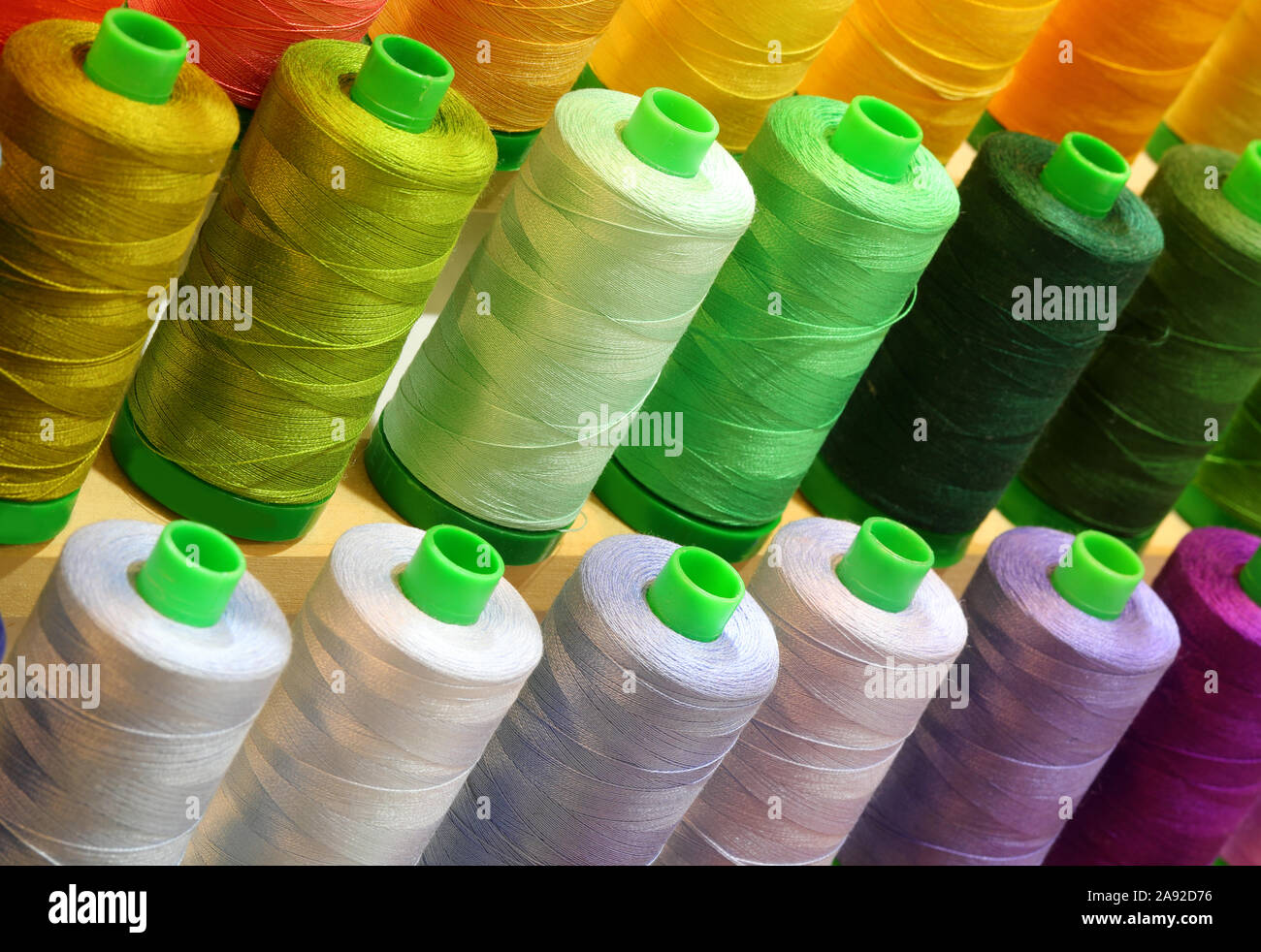 background of many sewing thread for sale at tailor store Stock Photo ...