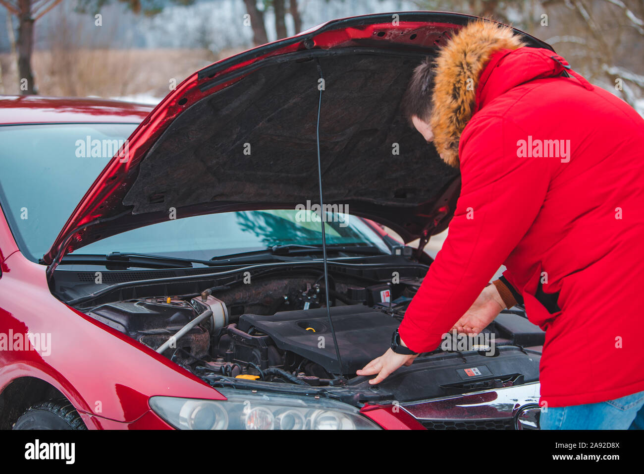 man opened car hood breakdown at highway road Stock Photo - Alamy