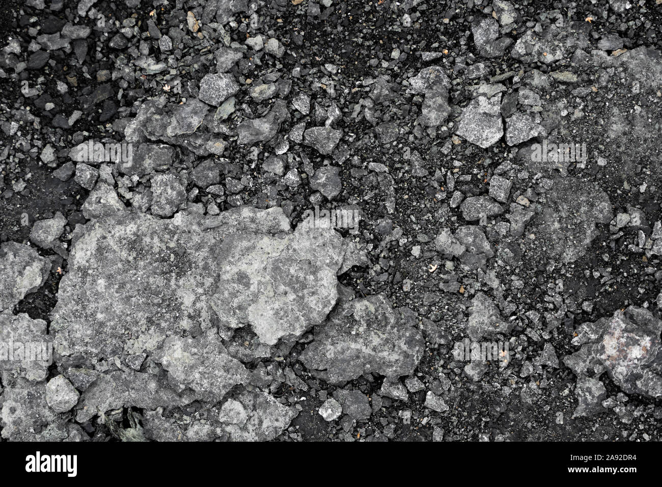 Black ground textured ground. Black soil as a backgdround or texture ...