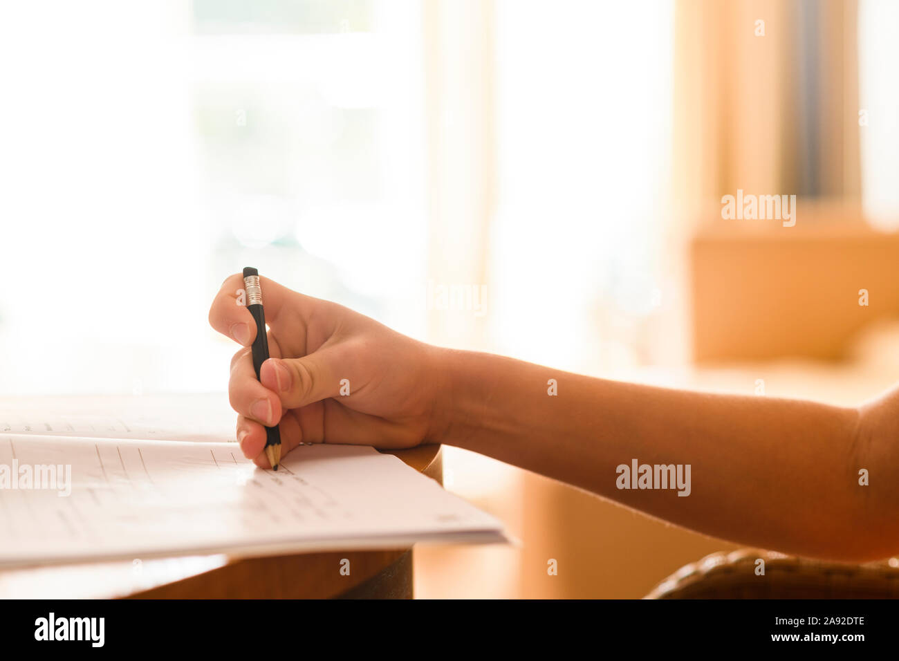 Hand with pencil Stock Photo - Alamy