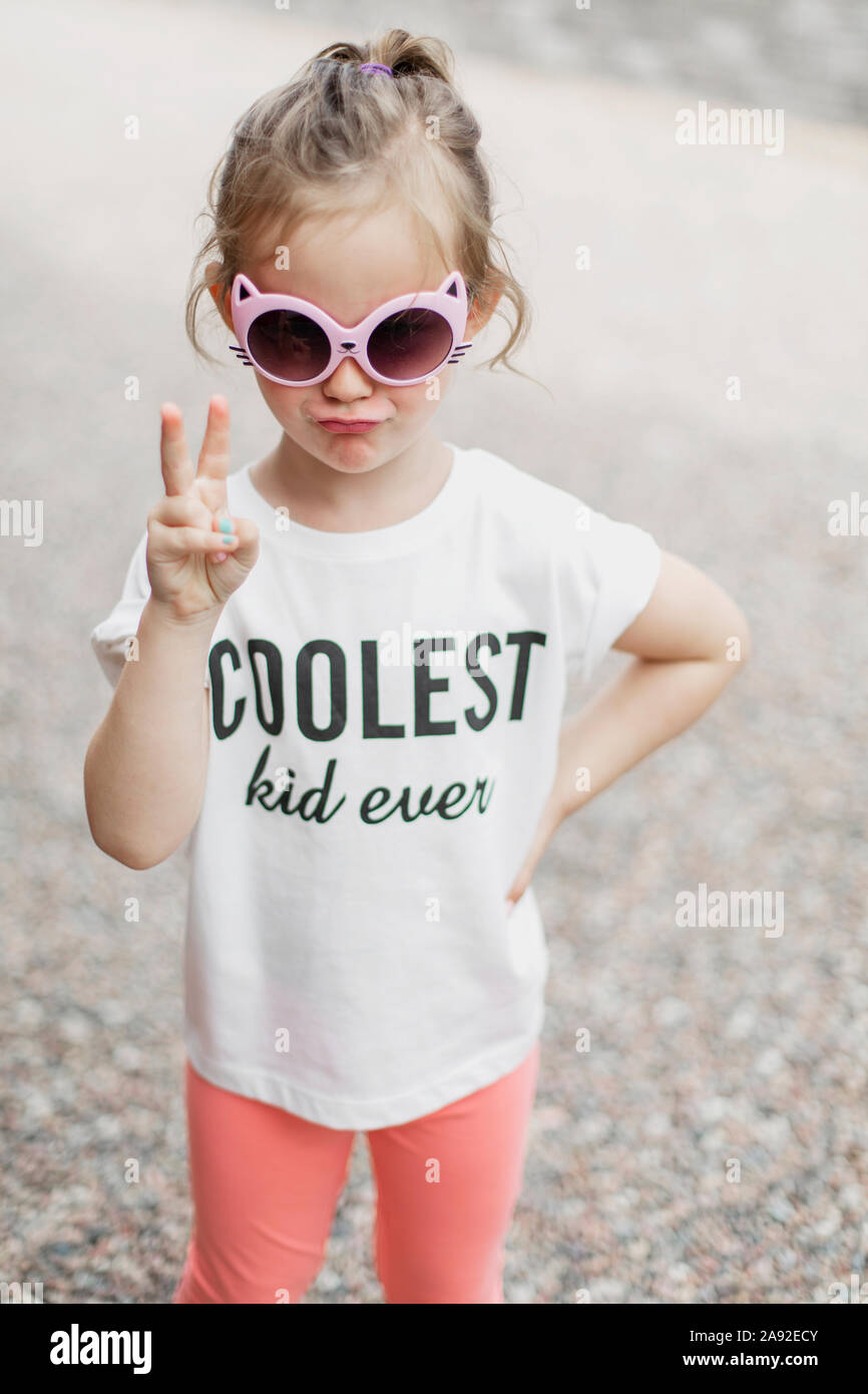 Caucasian girl making peace sign hi-res stock photography and images ...