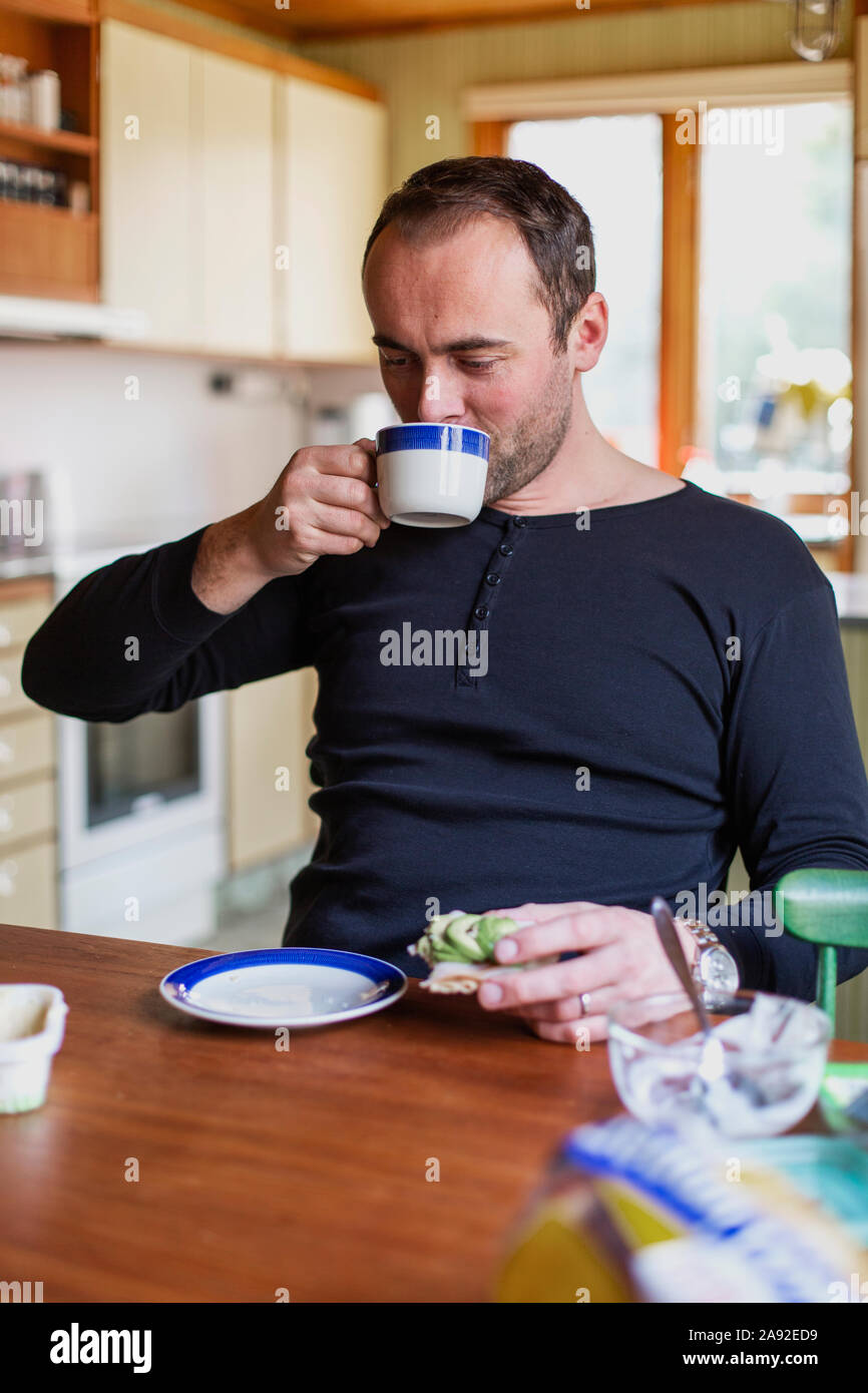 Man having coffee Stock Photo - Alamy