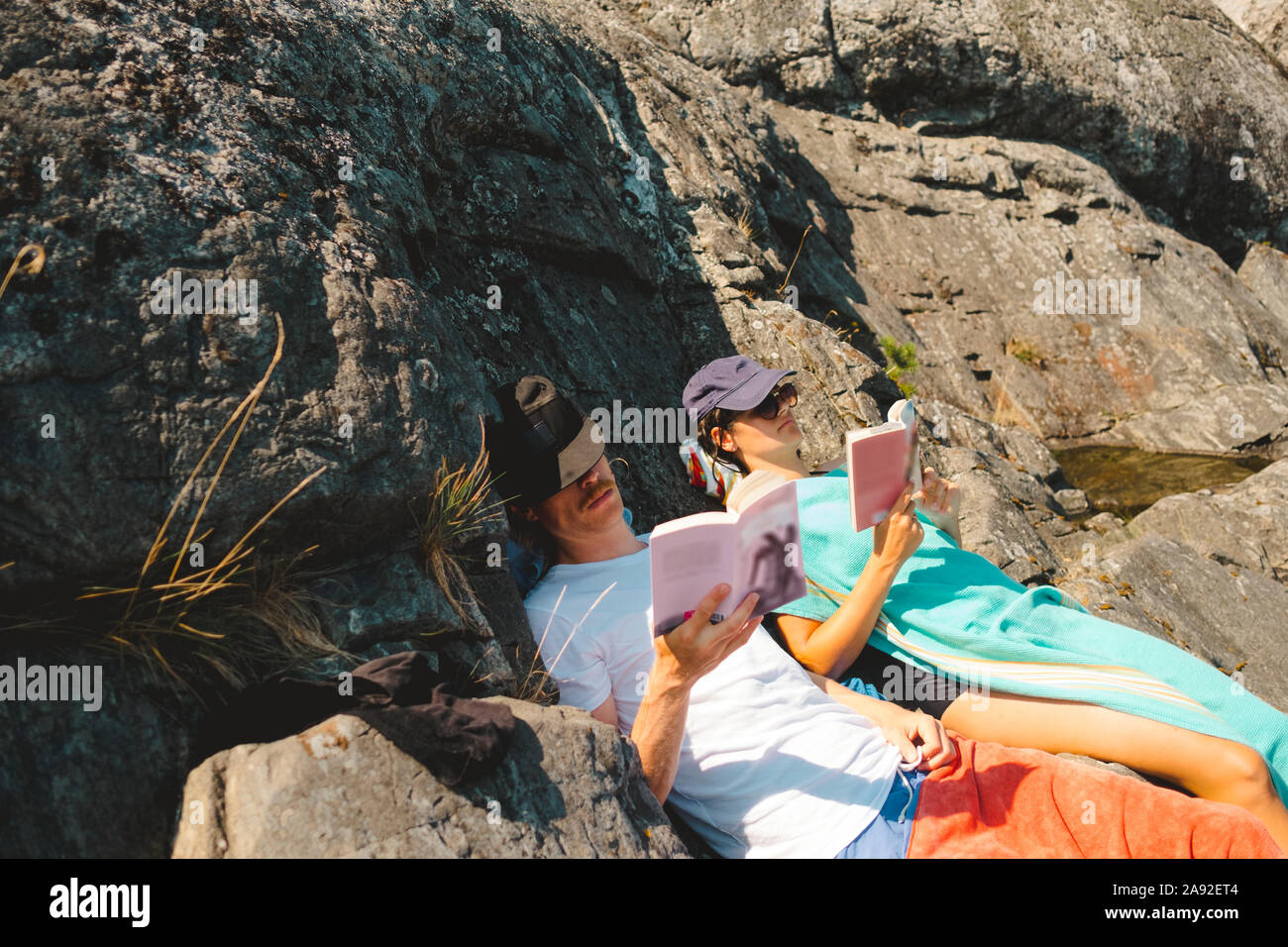 Man lying on rocks hi-res stock photography and images - Alamy