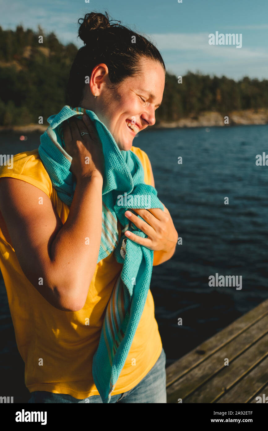 Woman drying herself Stock Photo - Alamy