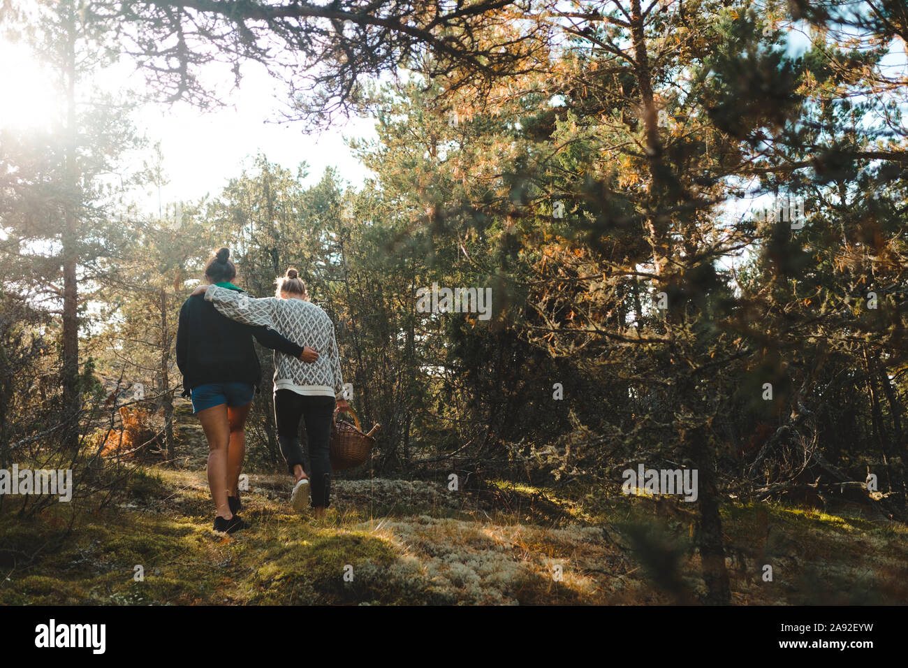 Women hug friends in hi-res stock photography and images - Alamy